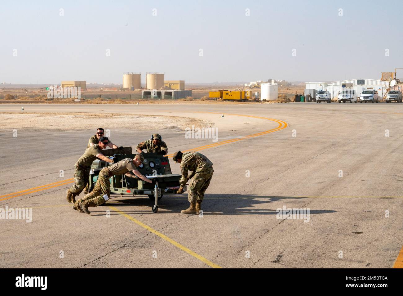 U.S. Air Force loadmasters assigned to the 816th Expeditionary Airlift ...