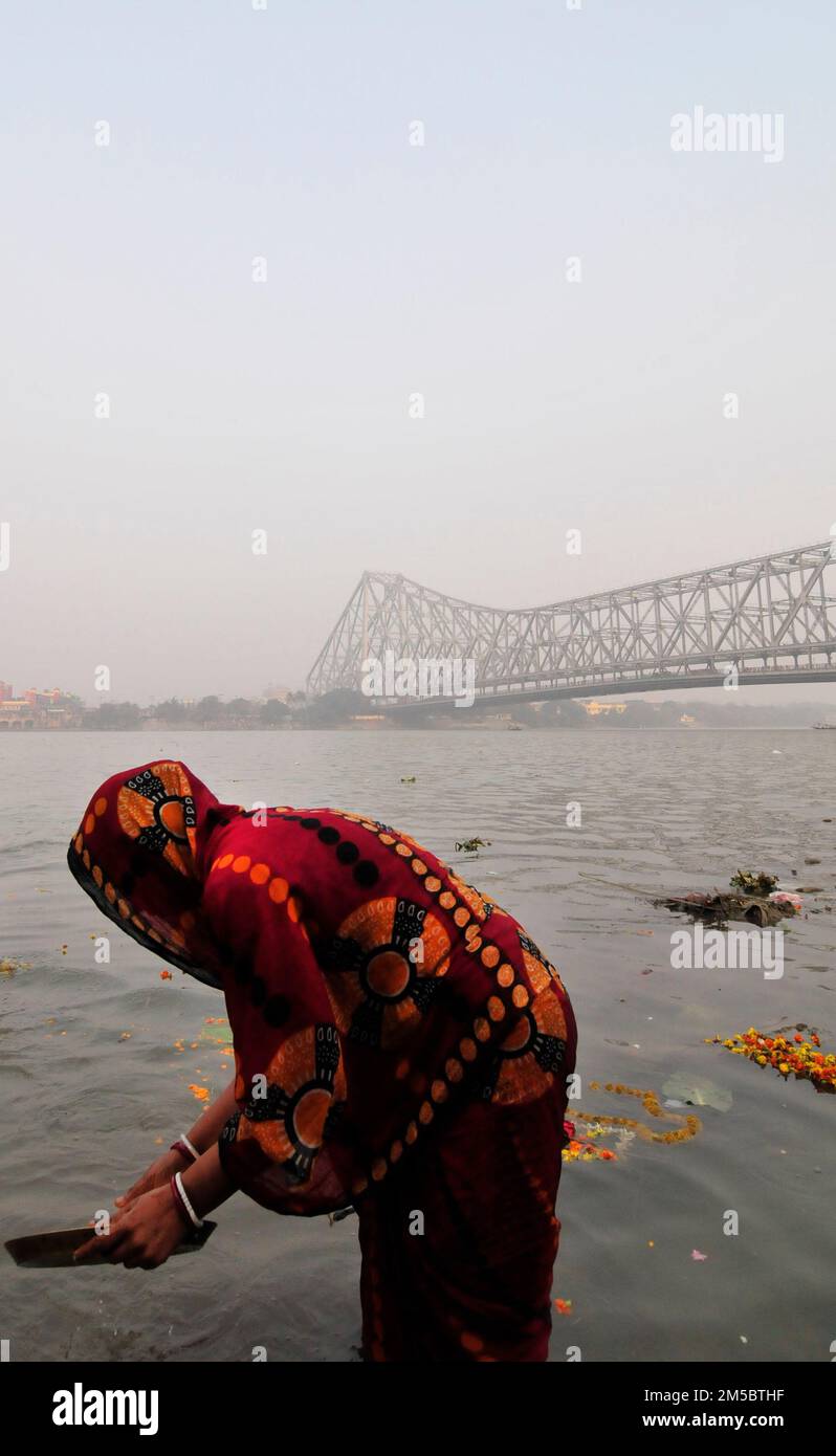 Indian woman bathing in river hi-res stock photography and images - Alamy