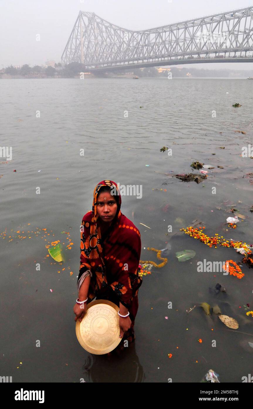 Indian woman bathing in river hi-res stock photography and images - Alamy