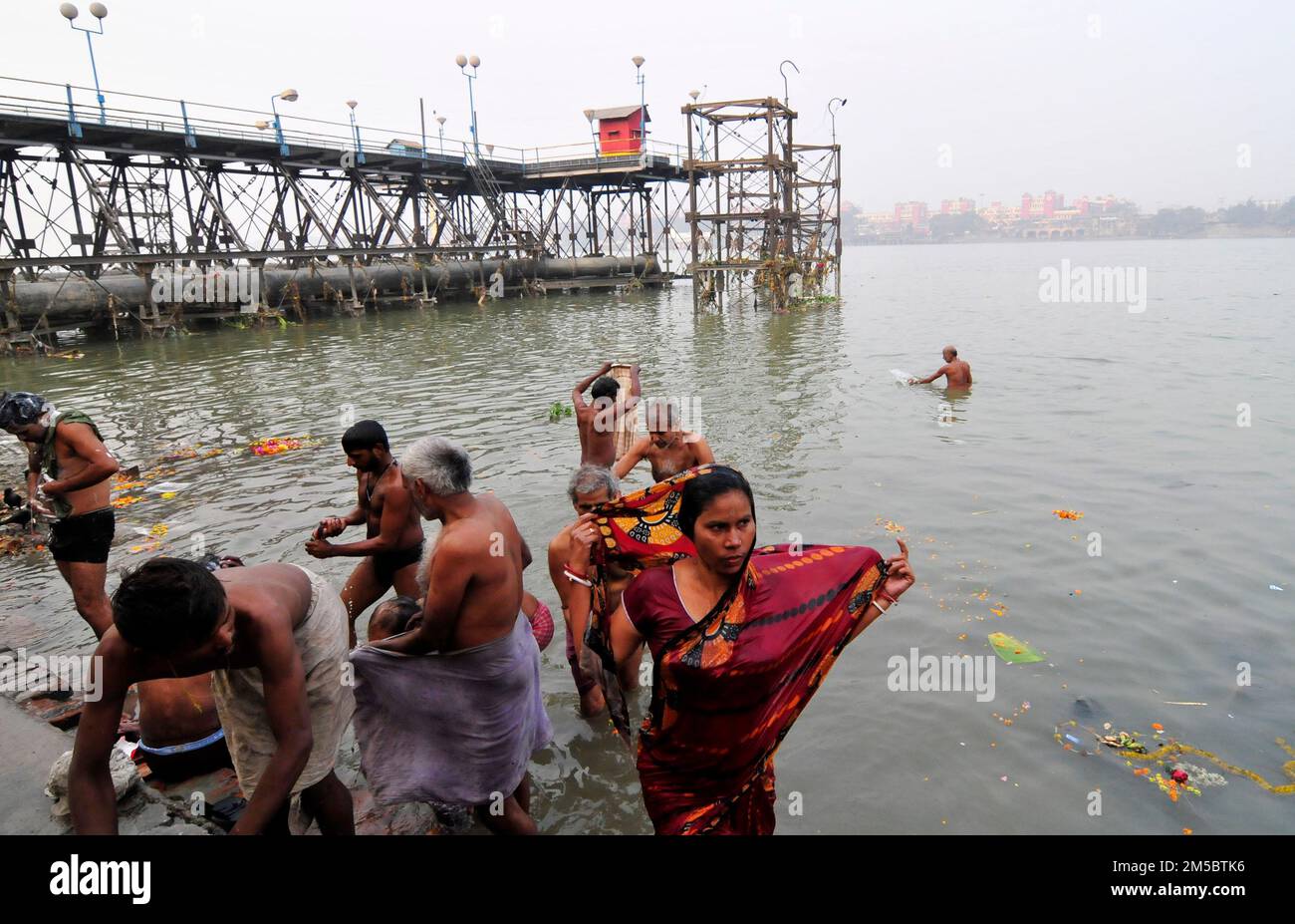 Bathing in the Hooghly river in Kolkata, West Bengal, India Stock Photo ...