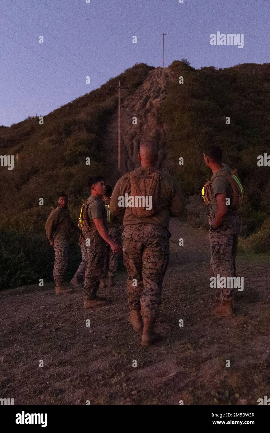 U.S. Marines with I Marine Expeditionary Force Information Group, hike ...