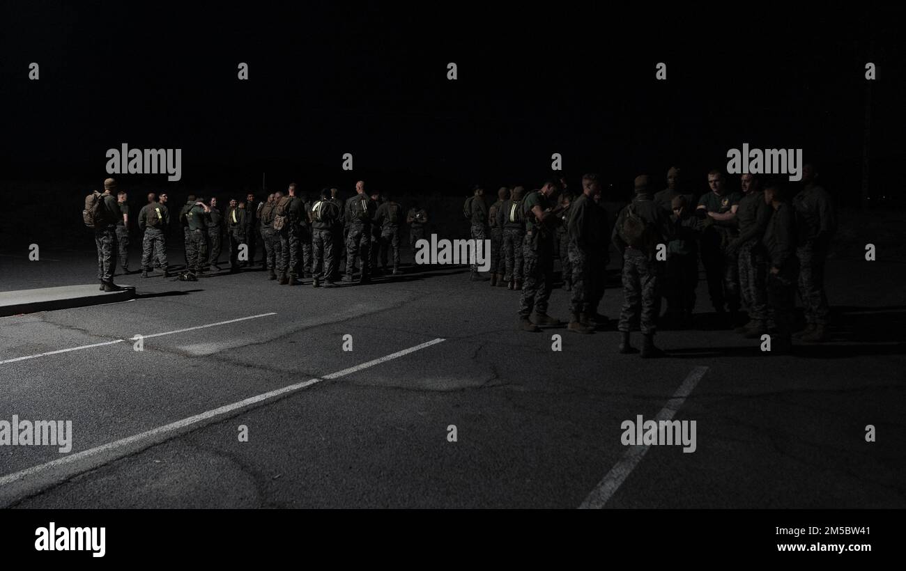 U.S. Marines with I Marine Expeditionary Force Information Group huddle ...