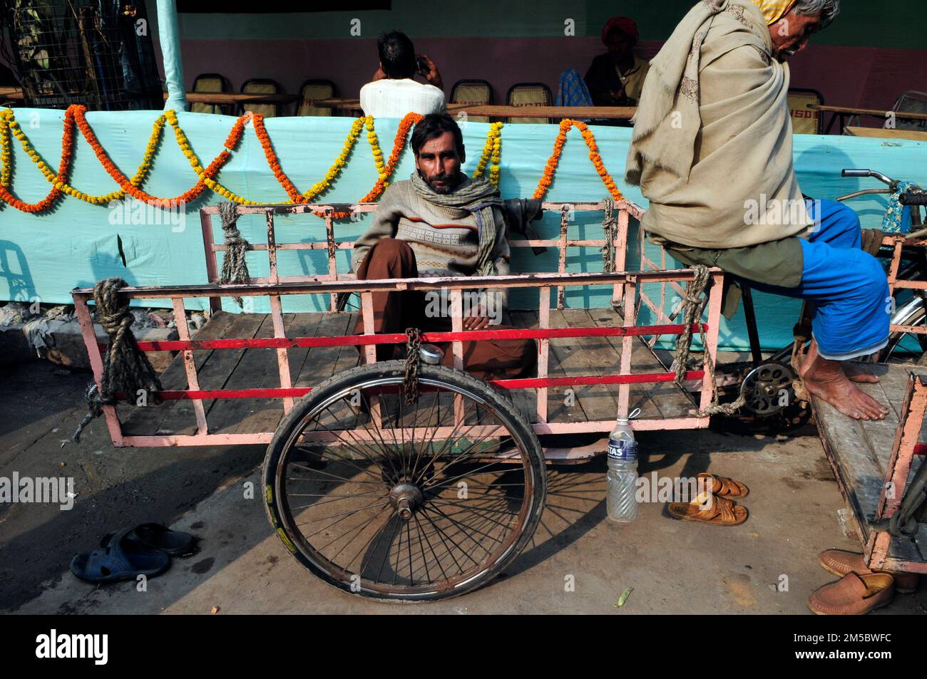 Rear loading rickshaws parked by a market in Kolkata, India Stock Photo ...