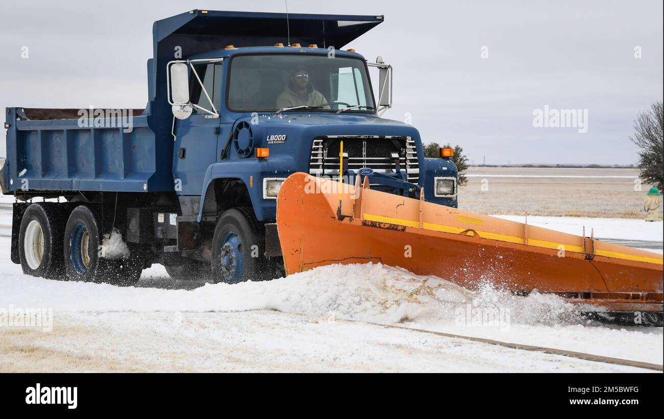 A Team Sheppard member runs a snow plow along Bridwell Road to clear of ...