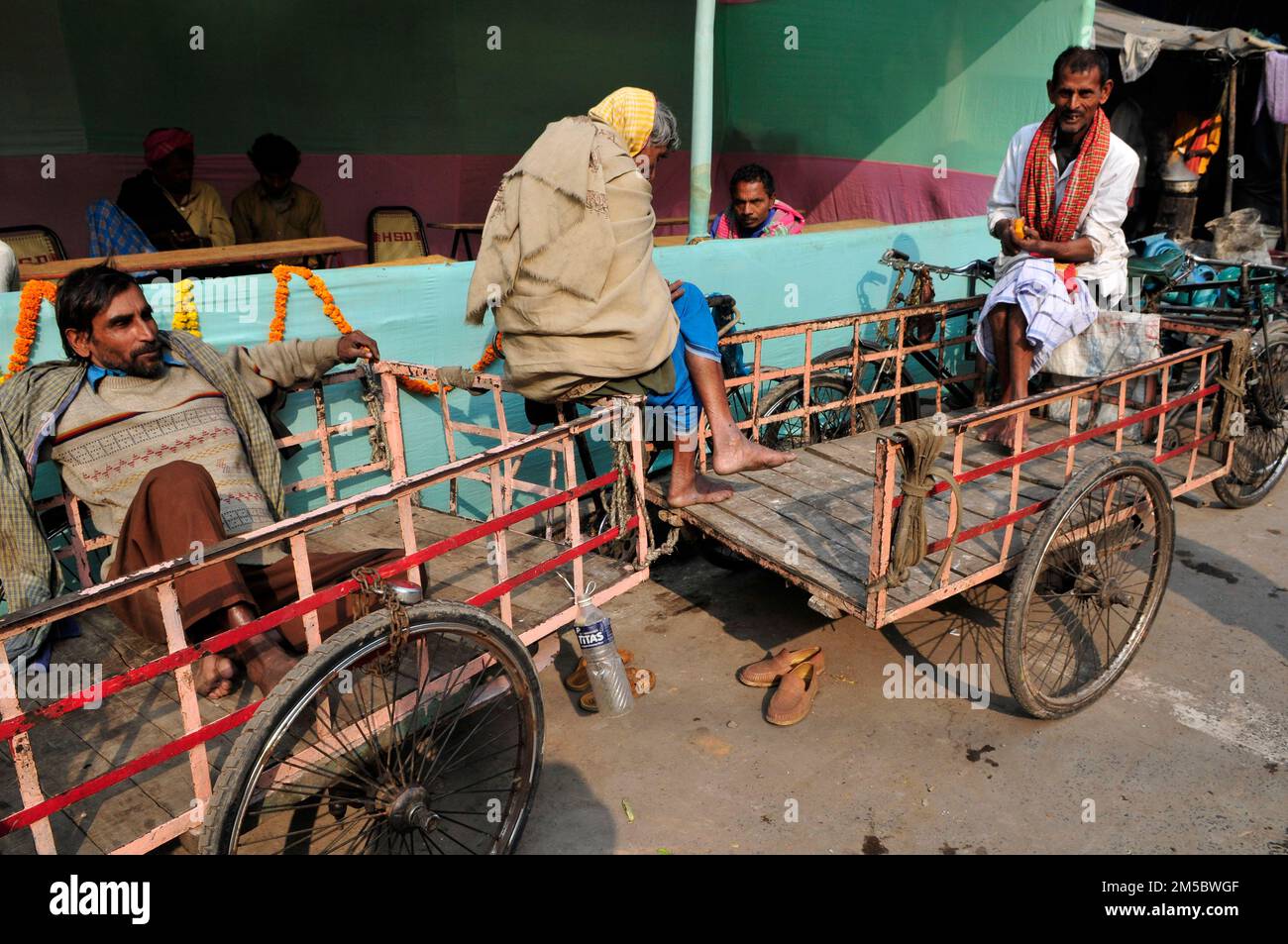 Rear loading rickshaws parked by a market in Kolkata, India Stock Photo ...