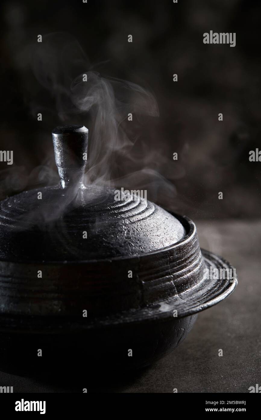 Rice Cooked in an Iron Pot Stock Photo - Alamy