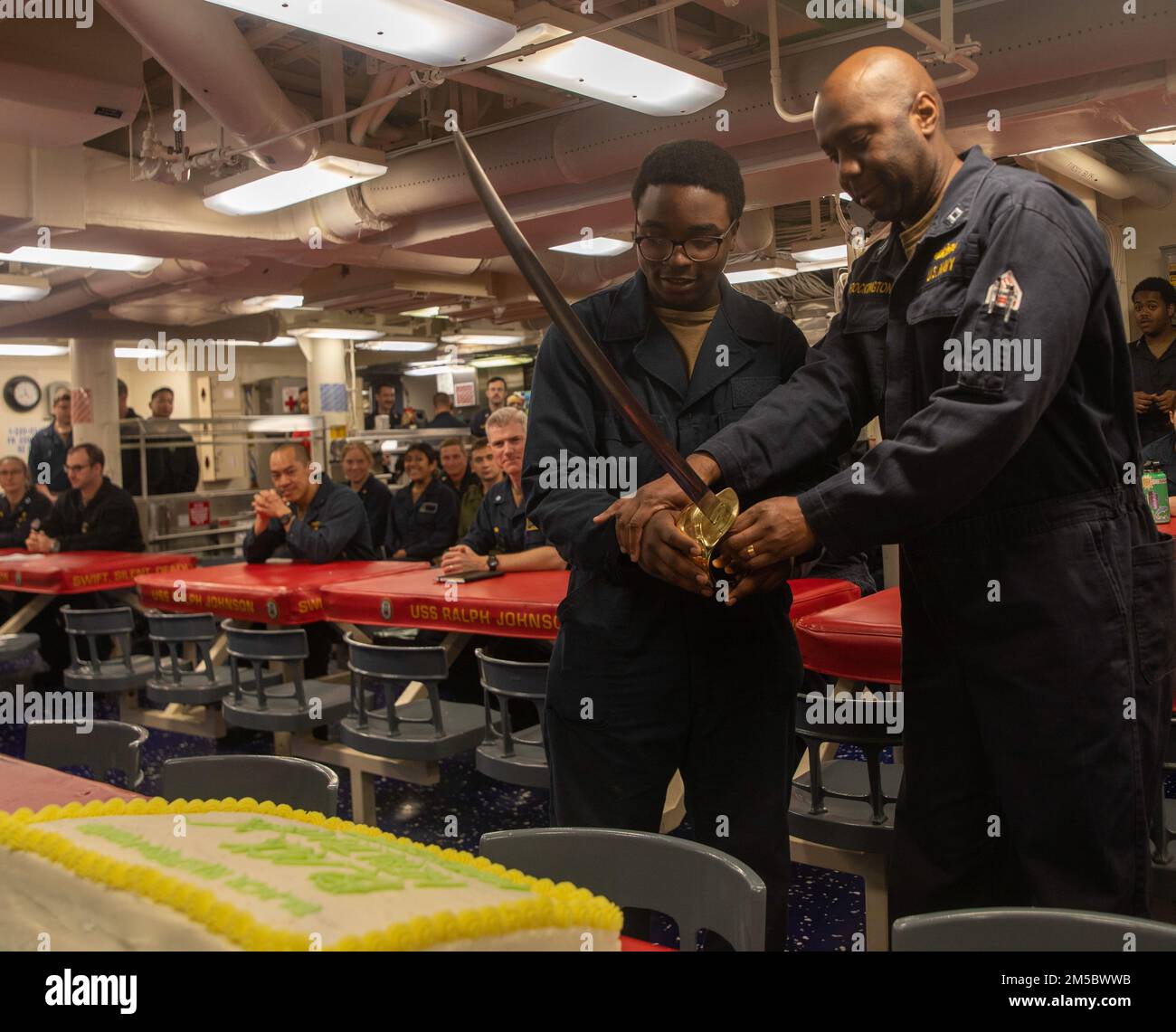SOUTH CHINA SEA (Feb. 24, 2022) Seaman Apprentice John Nunn (left ...