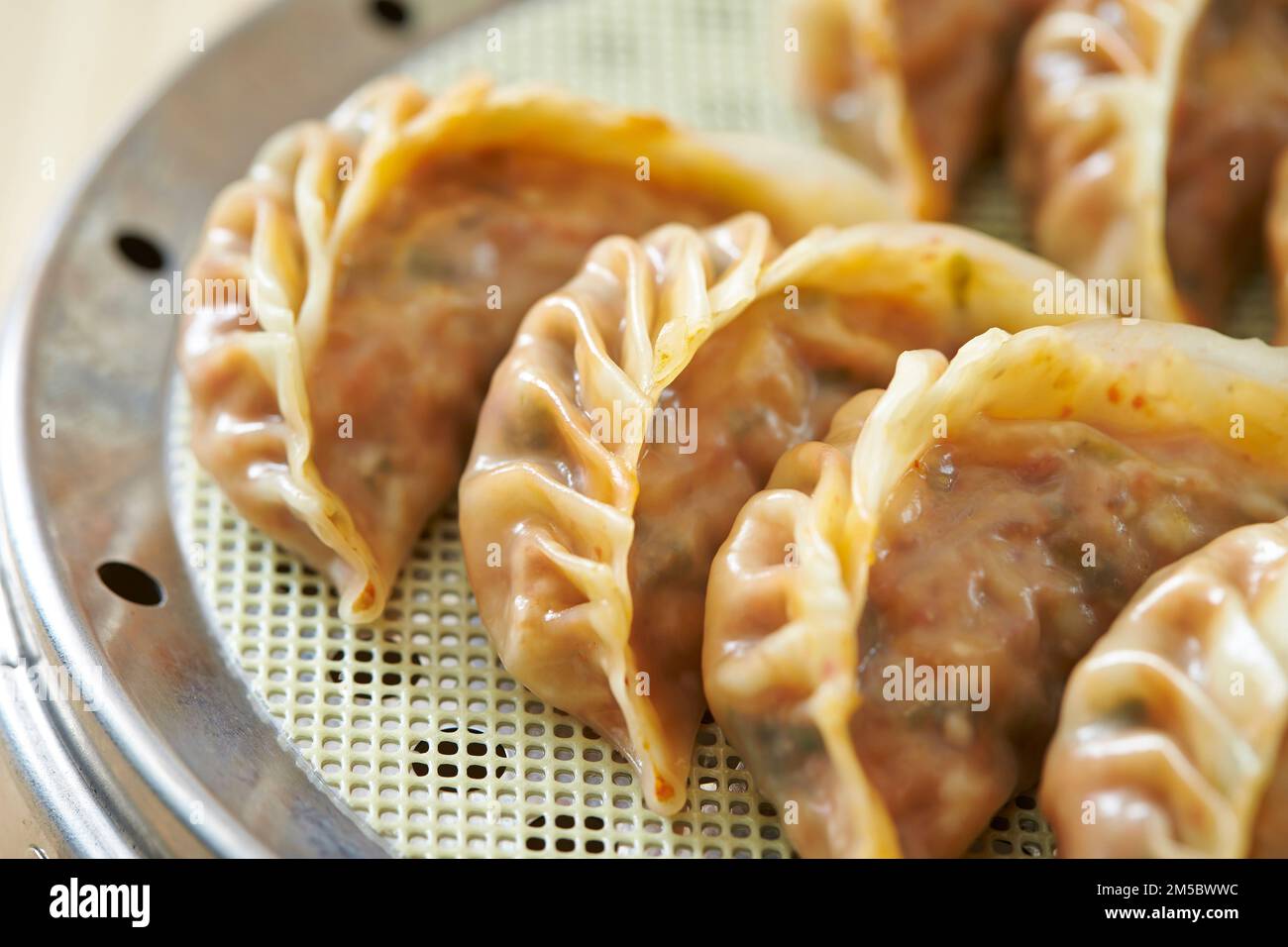 Kimchi steamed dumplings in a steamer Stock Photo - Alamy