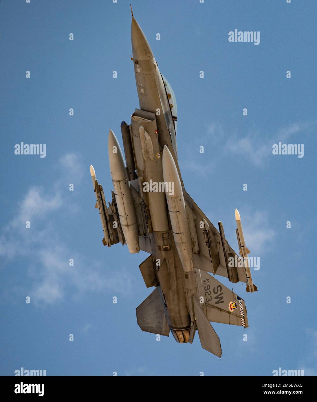 A 332d Air Expeditionary Wing F-16 Fighting Falcon passes over a runway ...