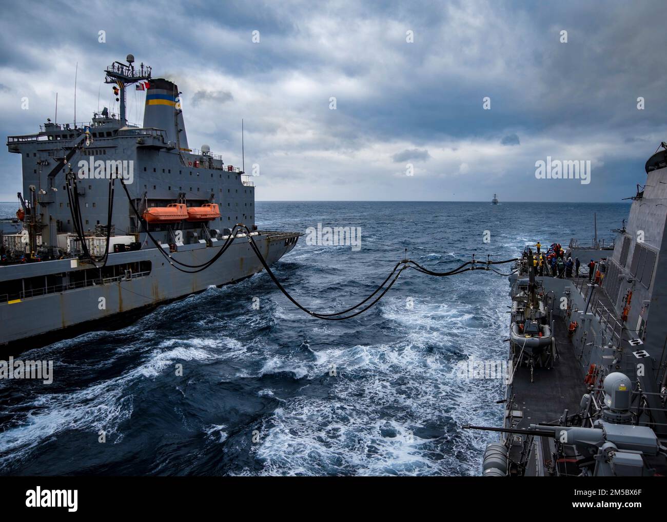 The guided missile destroyer USS Delbert D. Black (DGG 119) receives ...