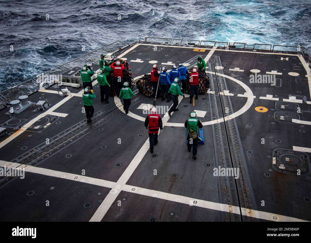 Sailors aboard the guided-missile destroyer USS Delbert D. Black (DGG ...