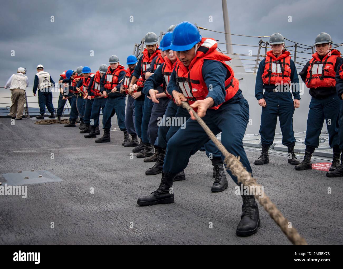 Sailors assigned to the guided missile destroyer USS Delbert D. Black ...