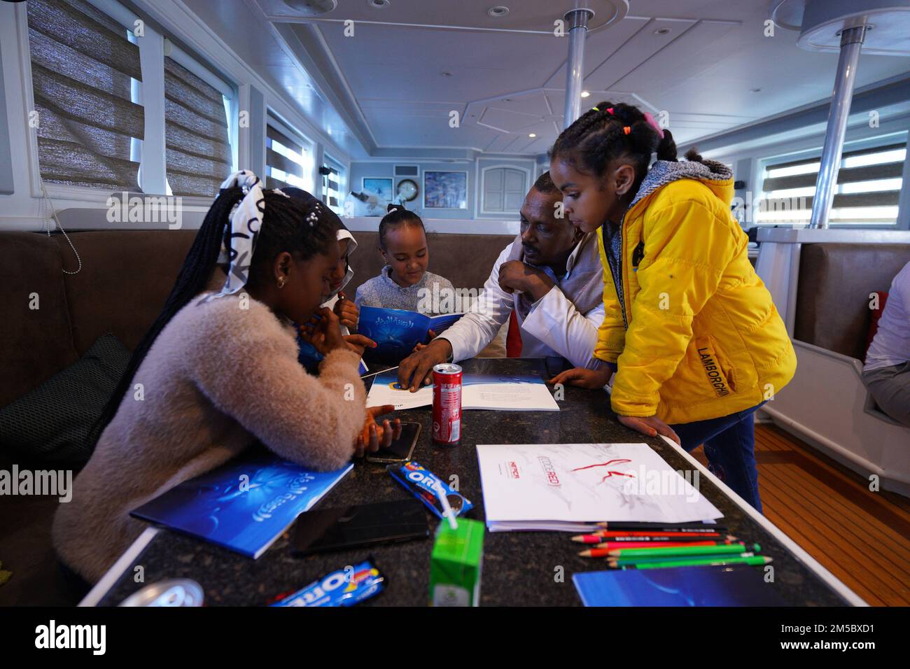 Students on HEPCA’s Bio Boat, a USAID-funded floating classroom that ...