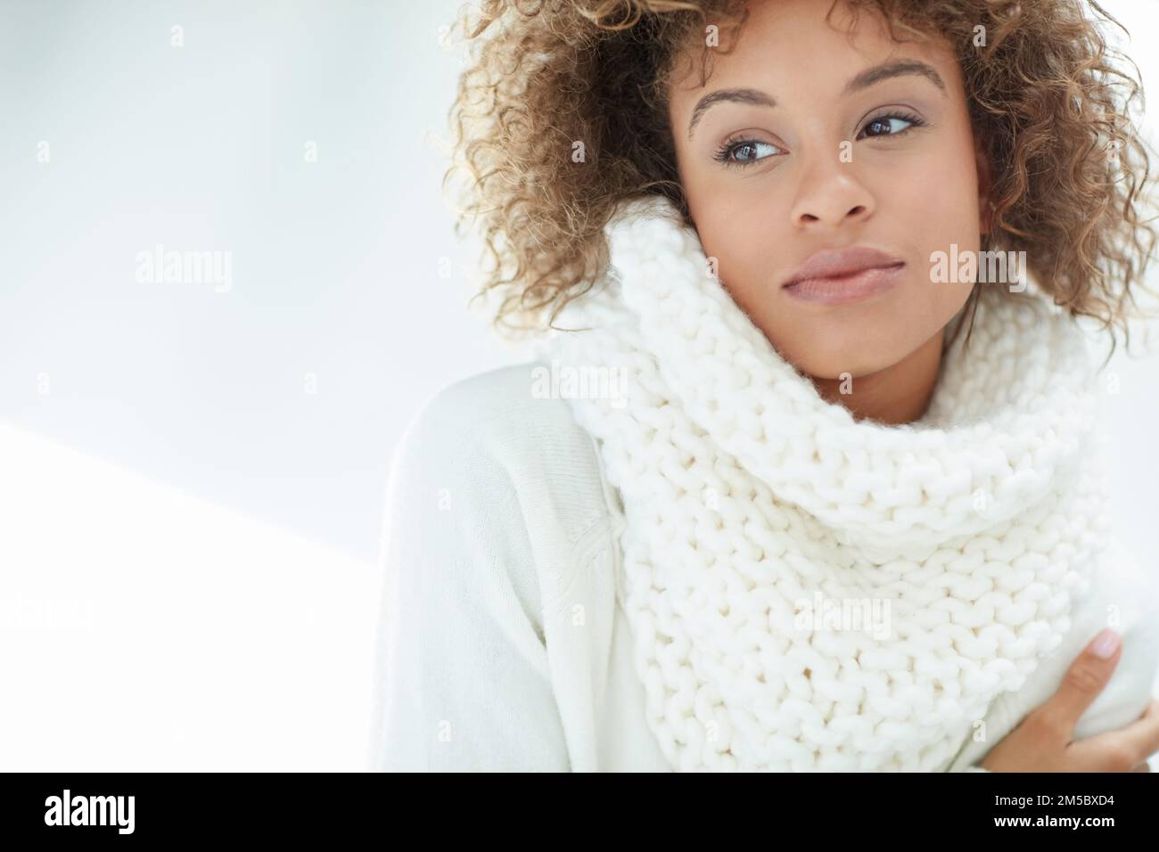 The cold months are no match for her style. an attractive young woman ...