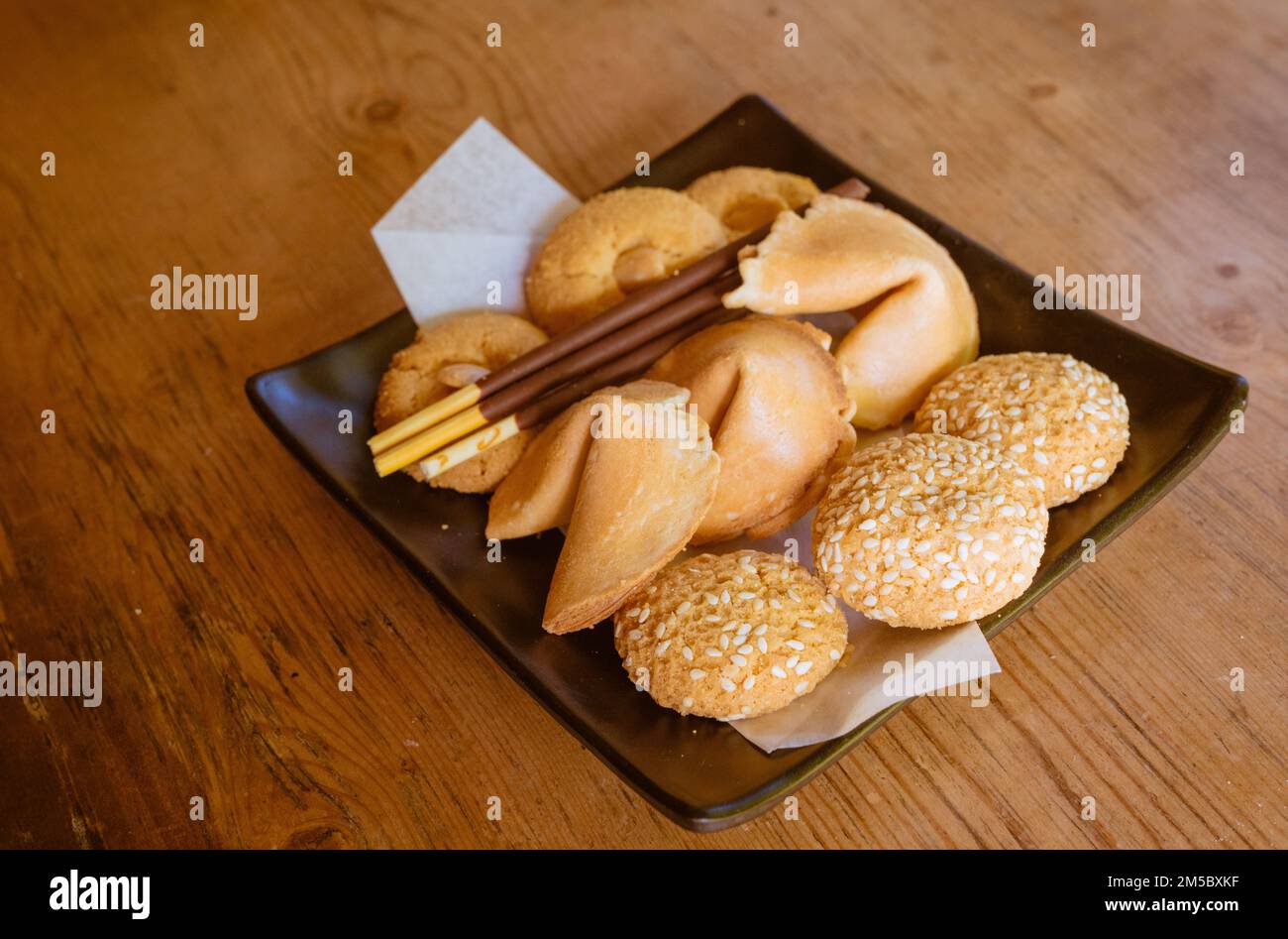 Asian dessert tray in open sunshine with tea Stock Photo - Alamy