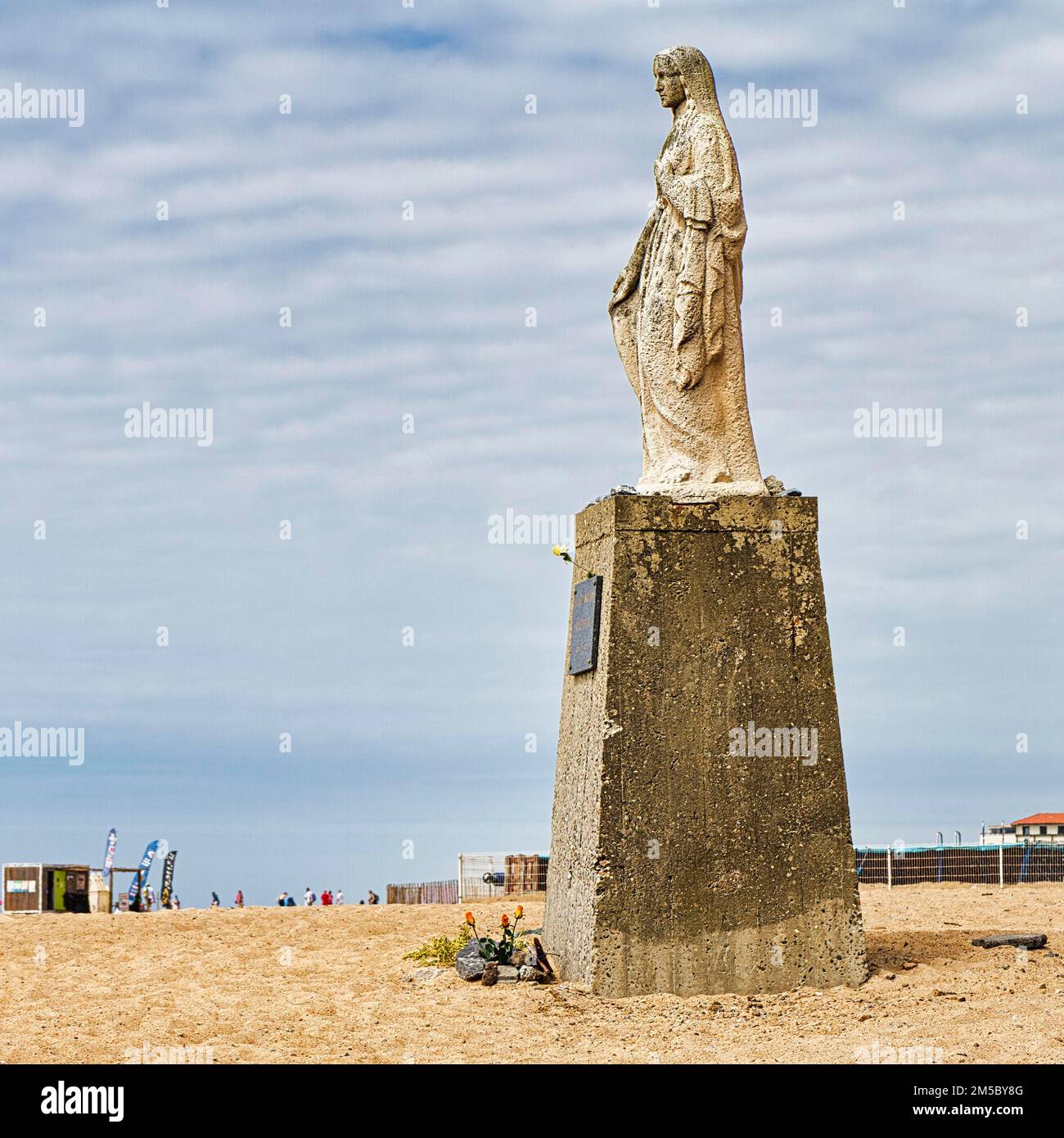 Statue of Mary on a pedestal, sculpture Notre Dame de la mer on the ...