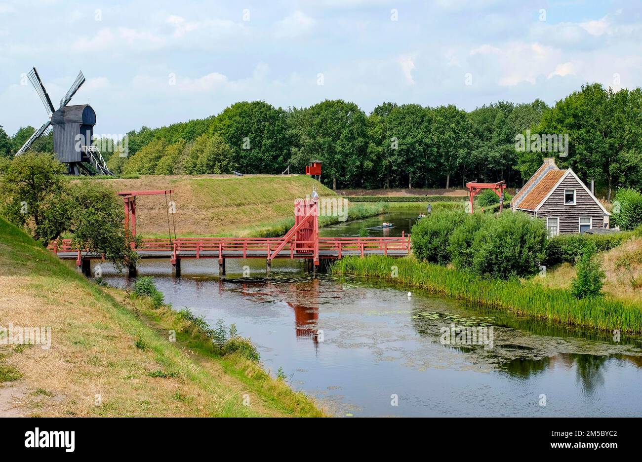 Bourtange Fortress, drawbridge over fortress moat, trestle windmill ...