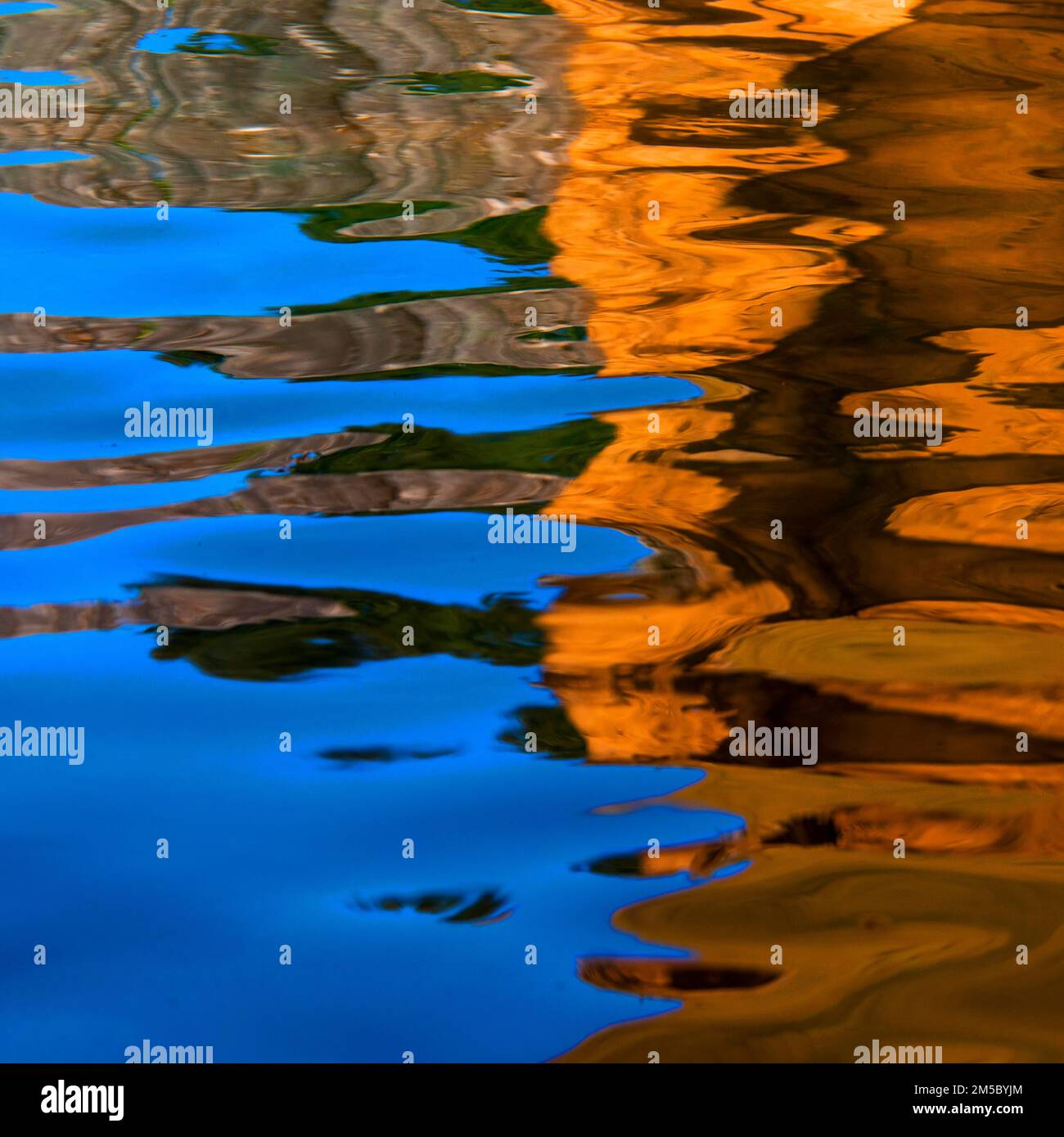Colored reflections in the water Stock Photo - Alamy