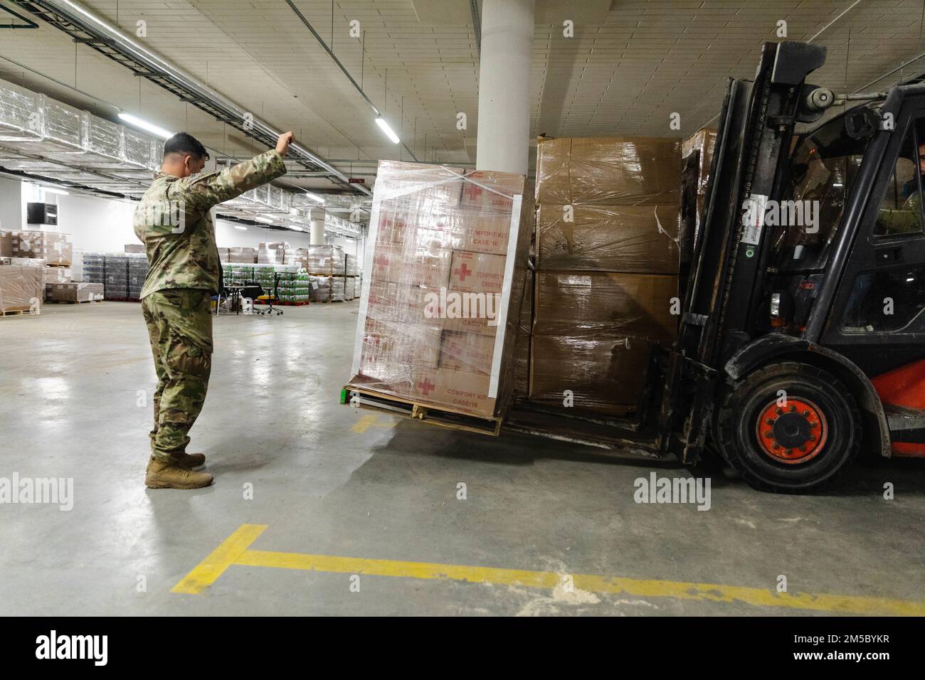 Paratroopers assigned to the 82nd Airborne Division, assist with ...