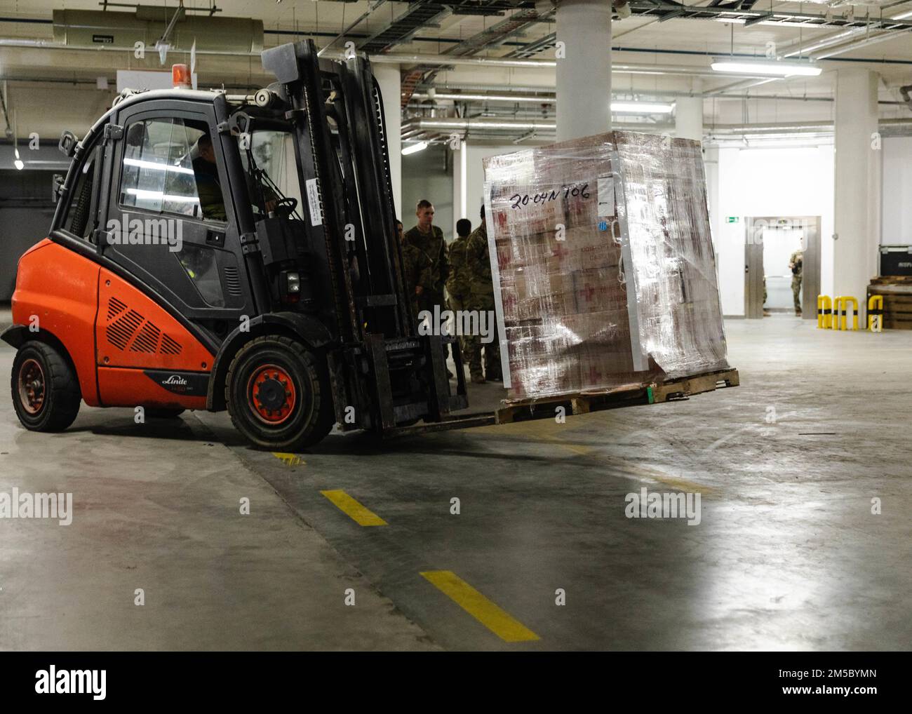 Paratroopers assigned to the 82nd Airborne Division, assist with ...