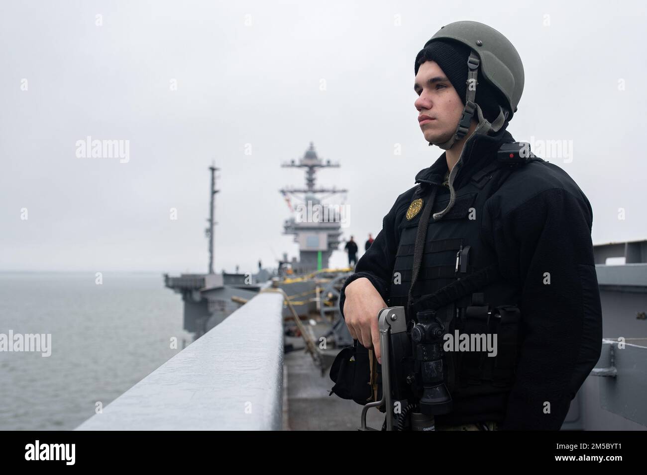 Master-at-Arms Seaman Robert Rowe, from Lansing, Kansas, assigned to ...
