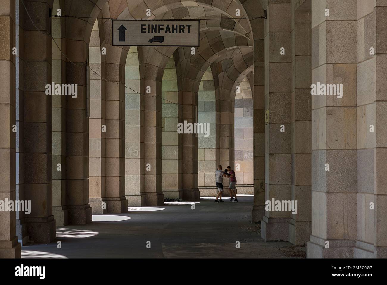 Two men boxing in the arcade of the Congress Hall, unfinished National ...