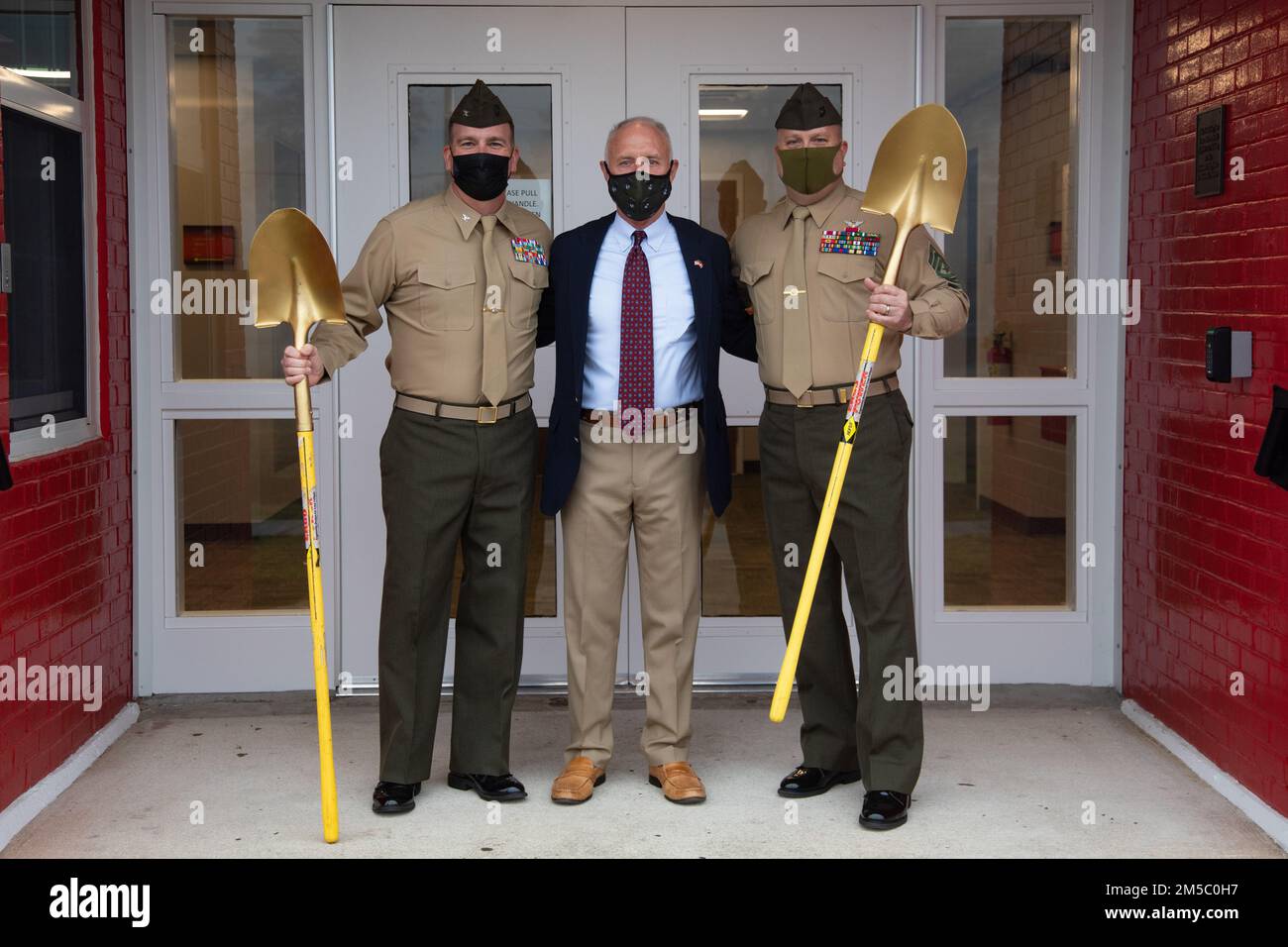 From left, U.S. Marine Corps Col. Eric J. Adams, Commanding Officer ...