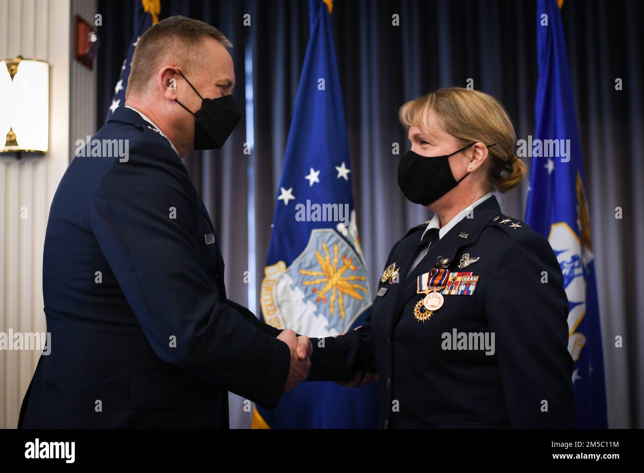 U.S. Air Force Maj. Gen. Dawne Deskins deputy director, Air National Guard, receives an award ...