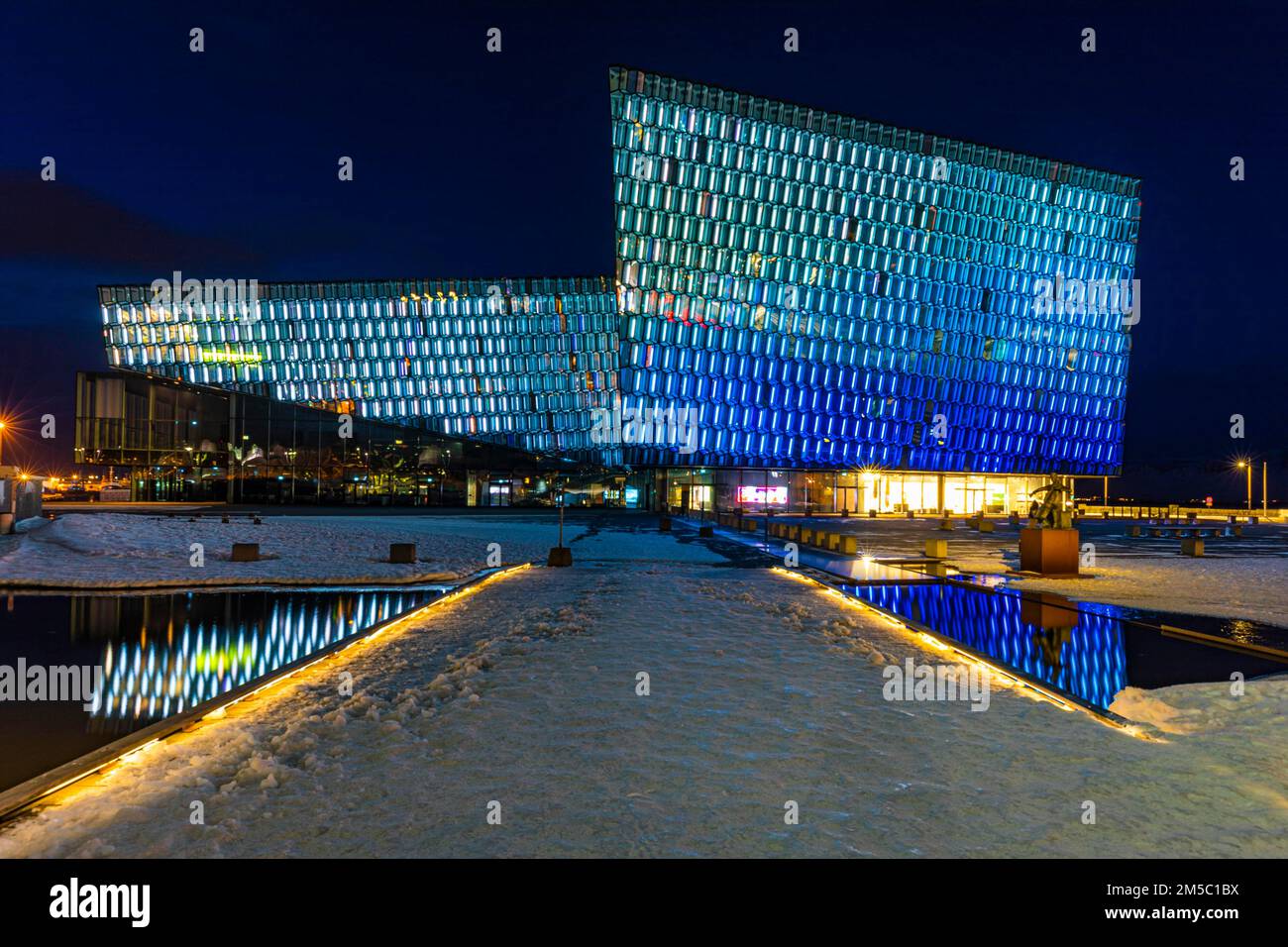 Illuminated facade of the Harpa Concert Hall and Congress Centre, night ...