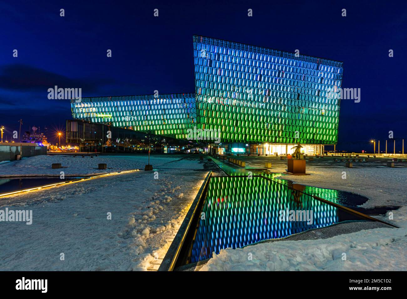 Illuminated facade of the Harpa Concert Hall and Congress Centre, night ...