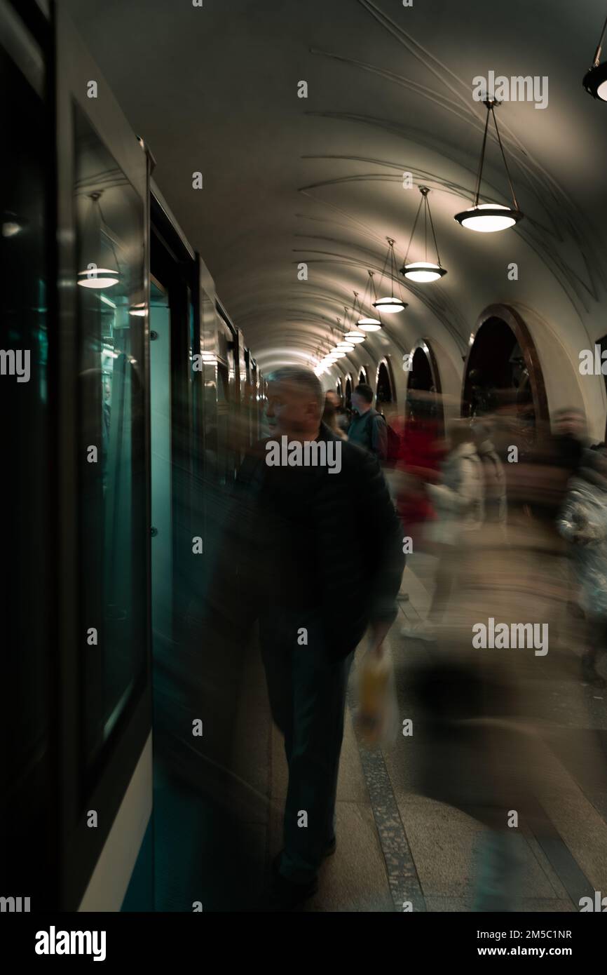 A vertical shot of people getting on the train in Moscow, Russia Stock ...