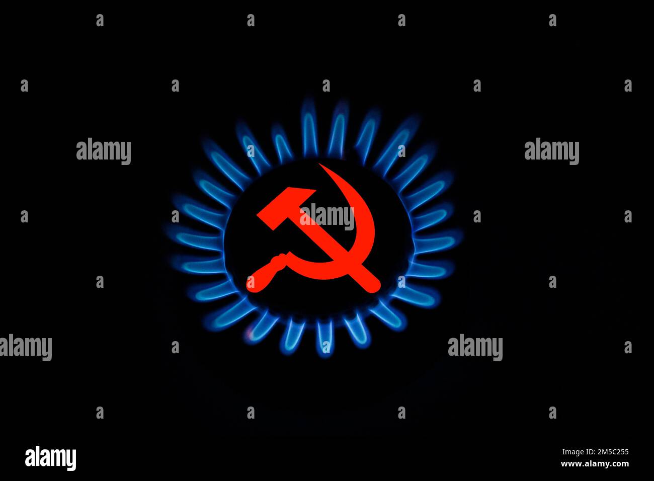 Symbol photo, hammer and sickle inside a round gas flame, studio ...