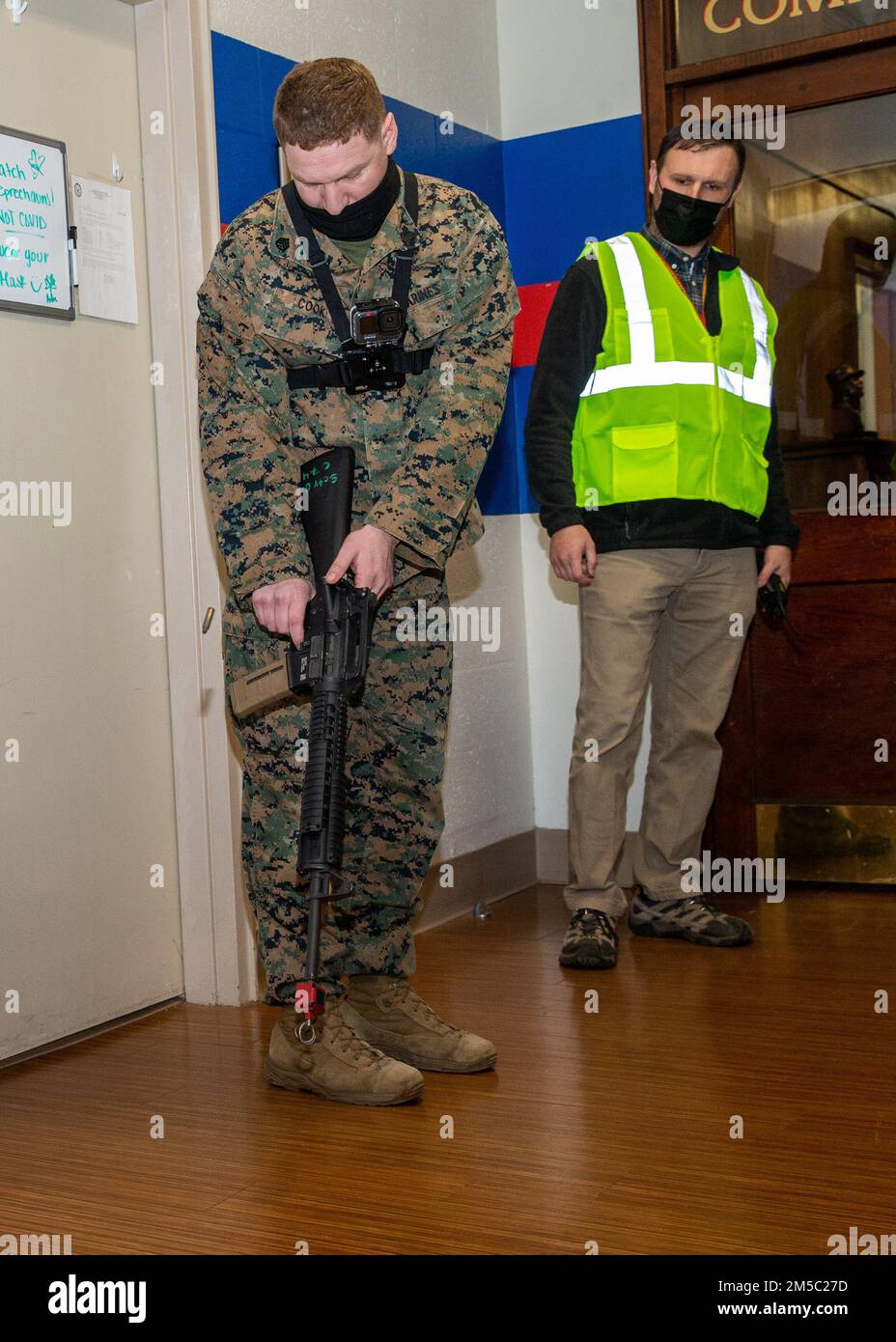 U.S. Marine Corps Staff Sgt. Adam J. Cook, a military police officer ...