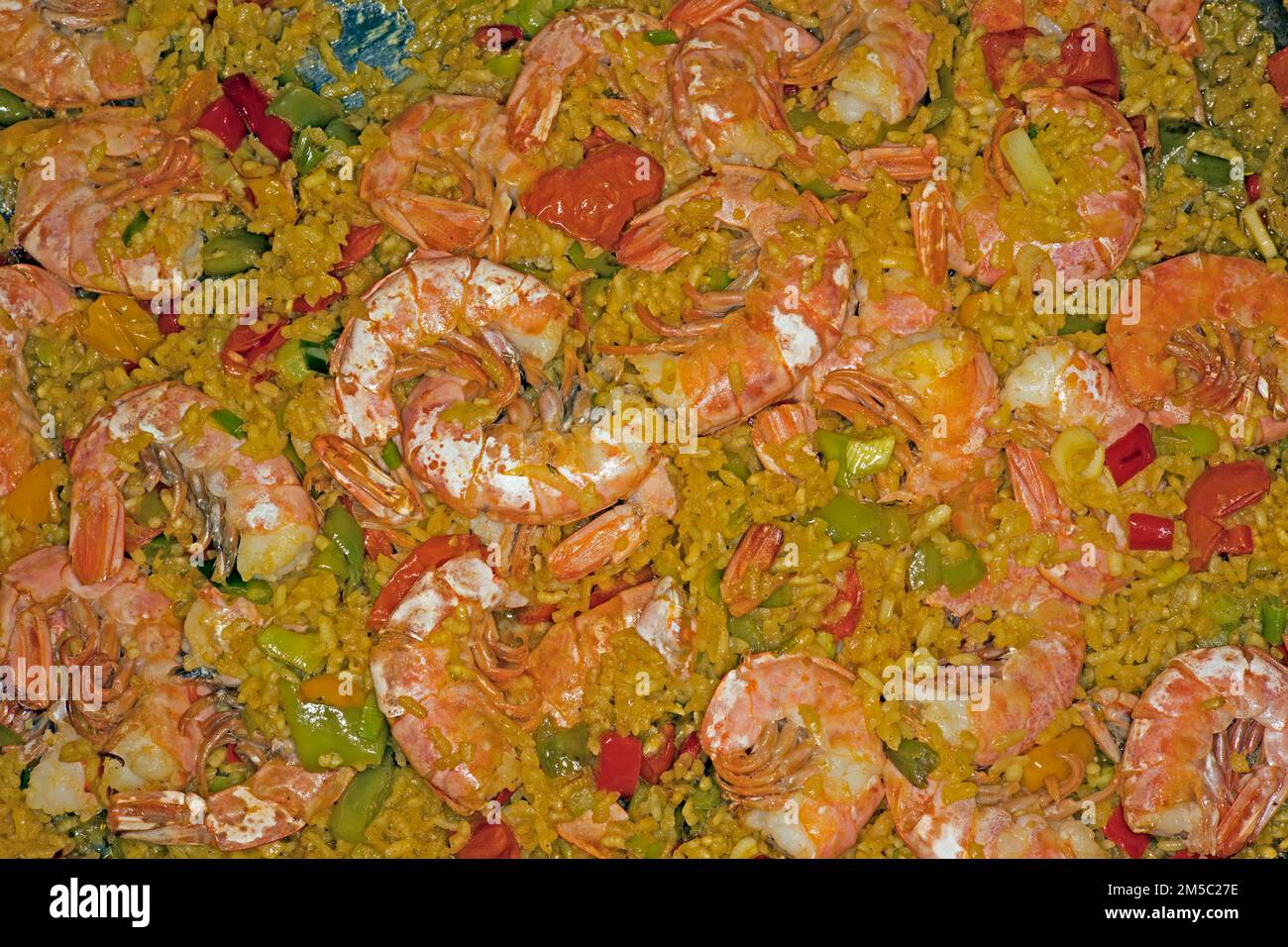 Spanish paella with peppers, bombareis and prawns, food photography ...