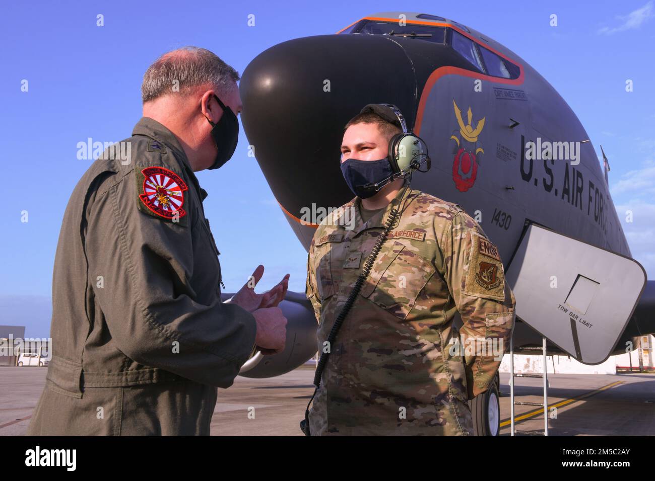 U.S. Air Force Lt. Gen. Ricky Rupp, 5th Air Force Commander, greets and ...
