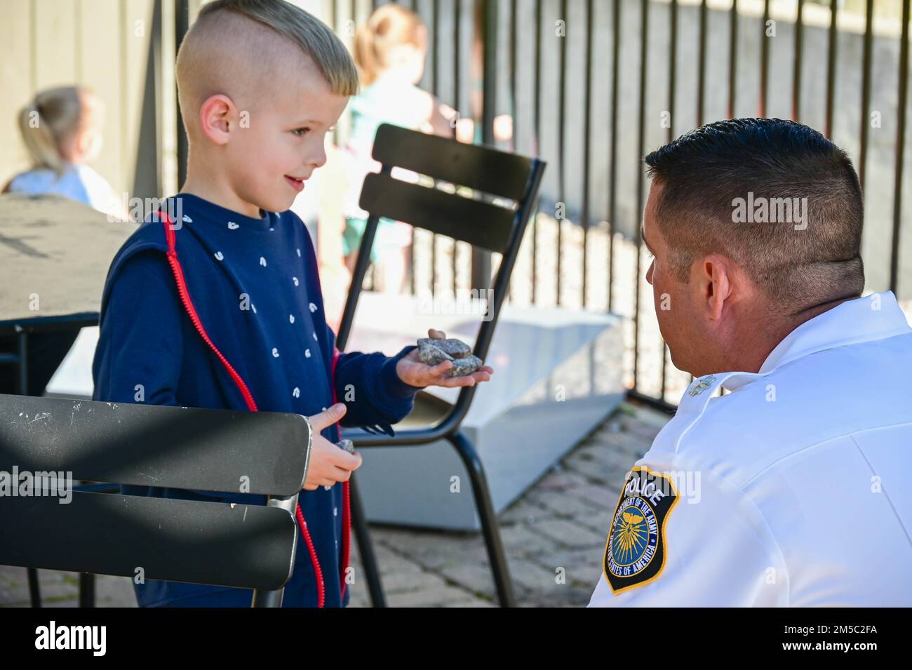 Michael Barnhart talks with John Hughes, Fort Jackson’s chief of police ...