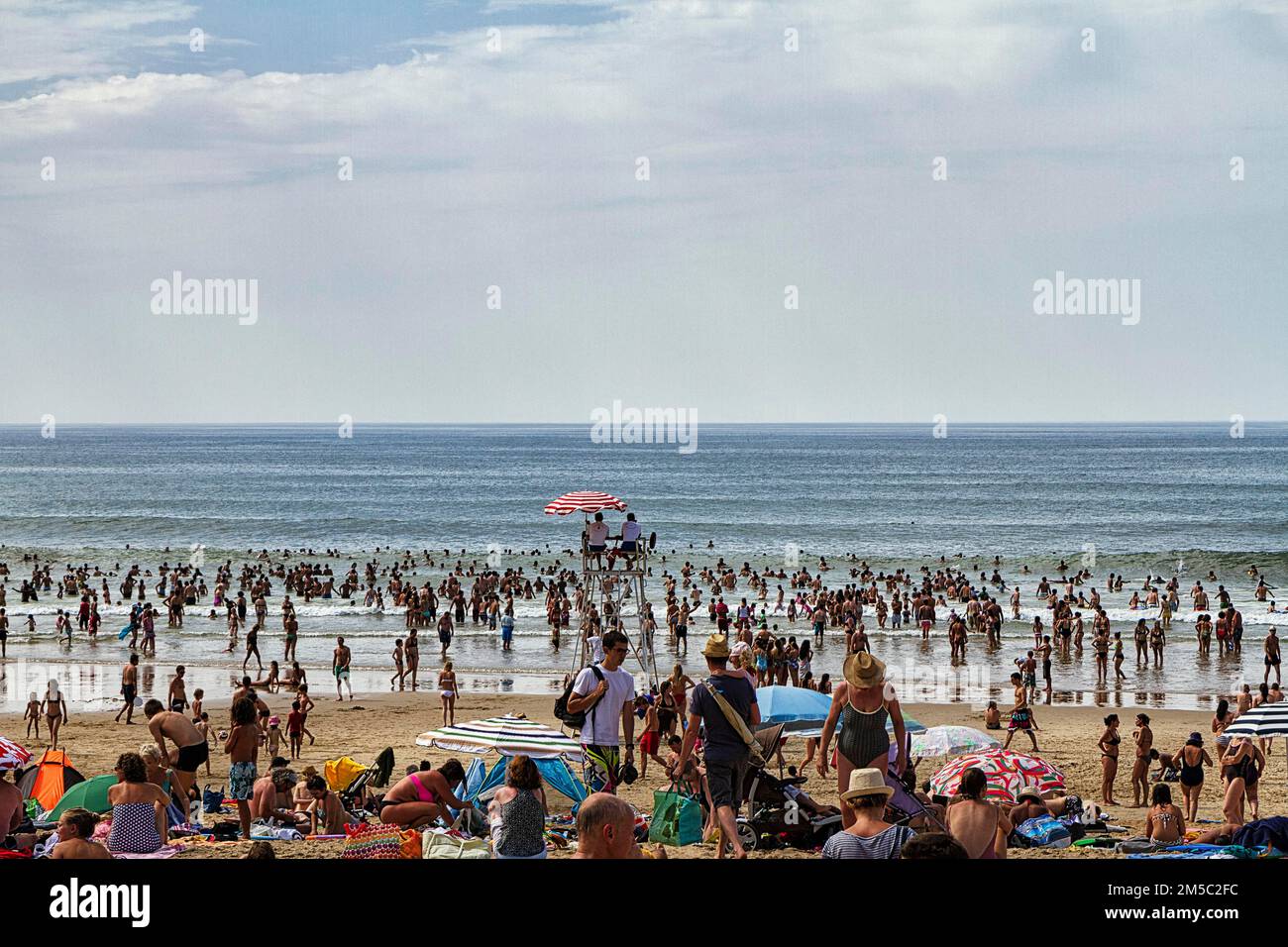Crowd, walkers, tourists on the beach, Grand Plage, Biarritz, Basque ...