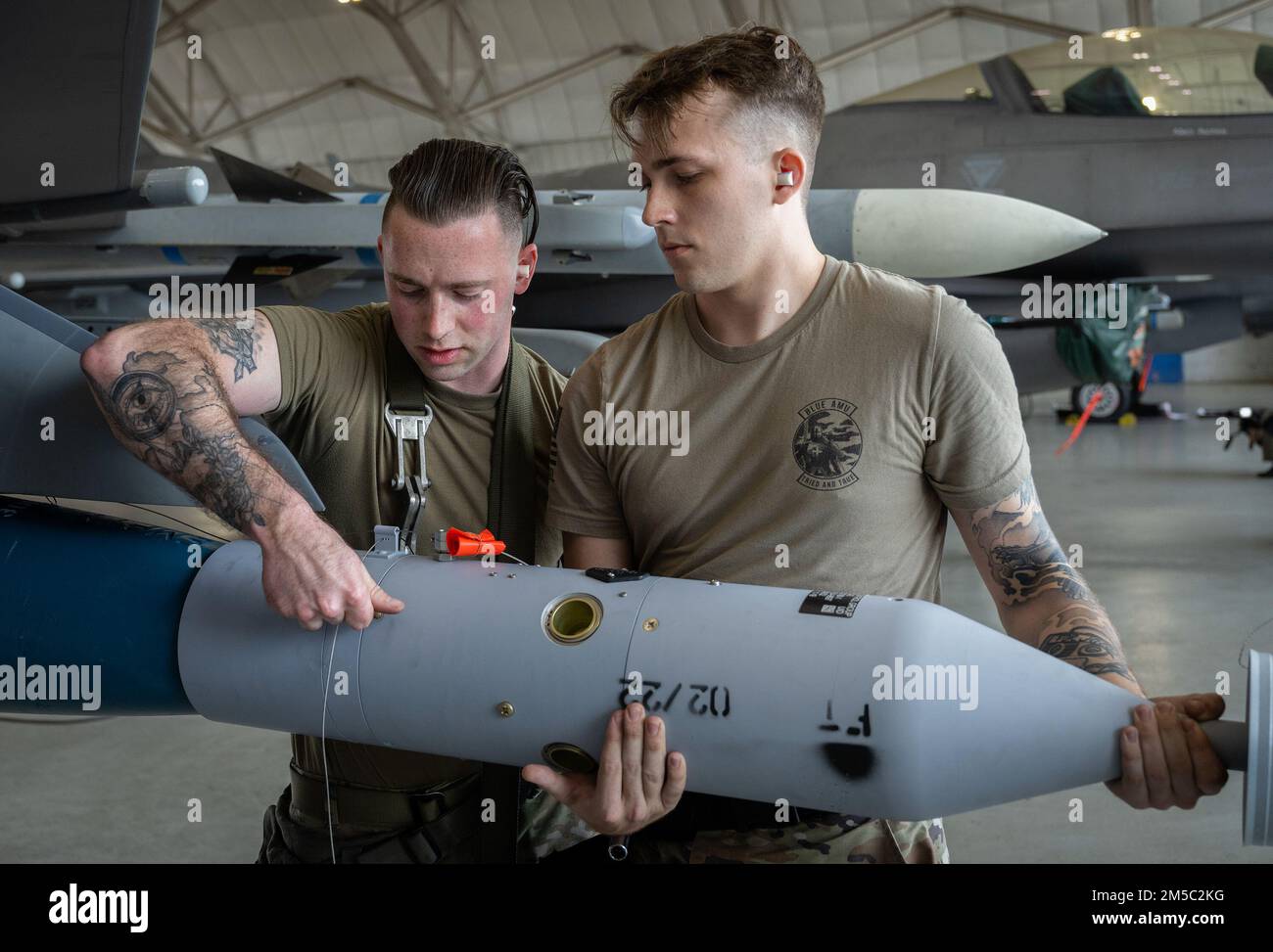 A 96th Aircraft Maintenance Squadron Blue team secures the guidance ...