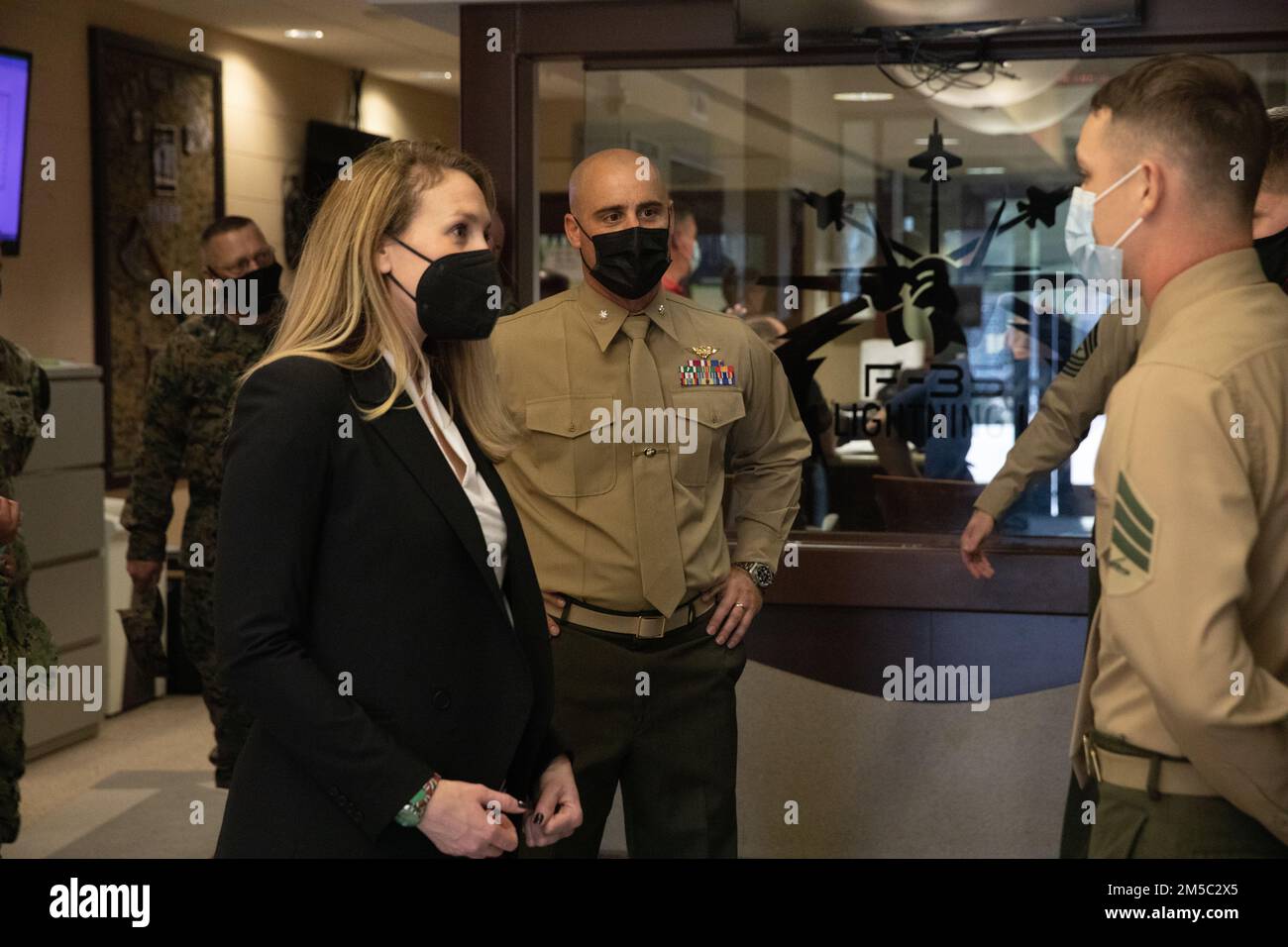 The Honorable Meredith A. Berger, Under Secretary of the Navy, stops to ...