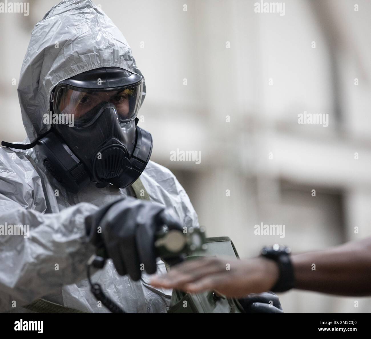 U.S. Army Spc. Jose Vazquez, a chemical, biological, radiological, and ...