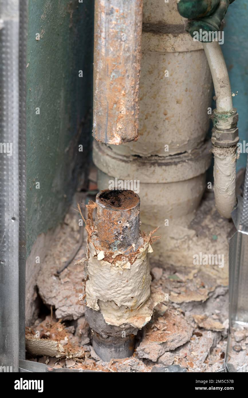 Old water pipe clogged with rust Stock Photo - Alamy