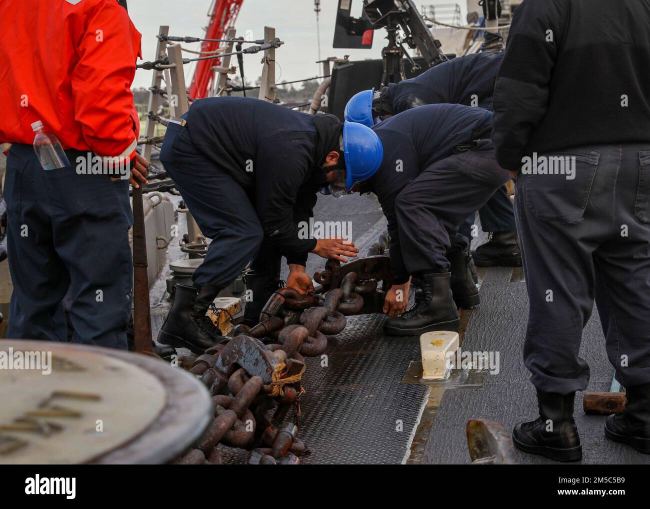 ROTA, Spain (Feb. 28, 2022) – Sailors apply a housing stopper to the ...