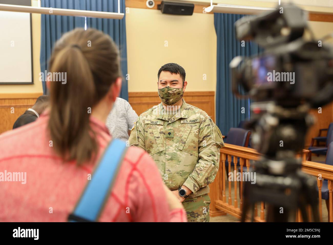 Spc. Hector Velez, a 1st Infantry Division Soldier, gives an interview ...