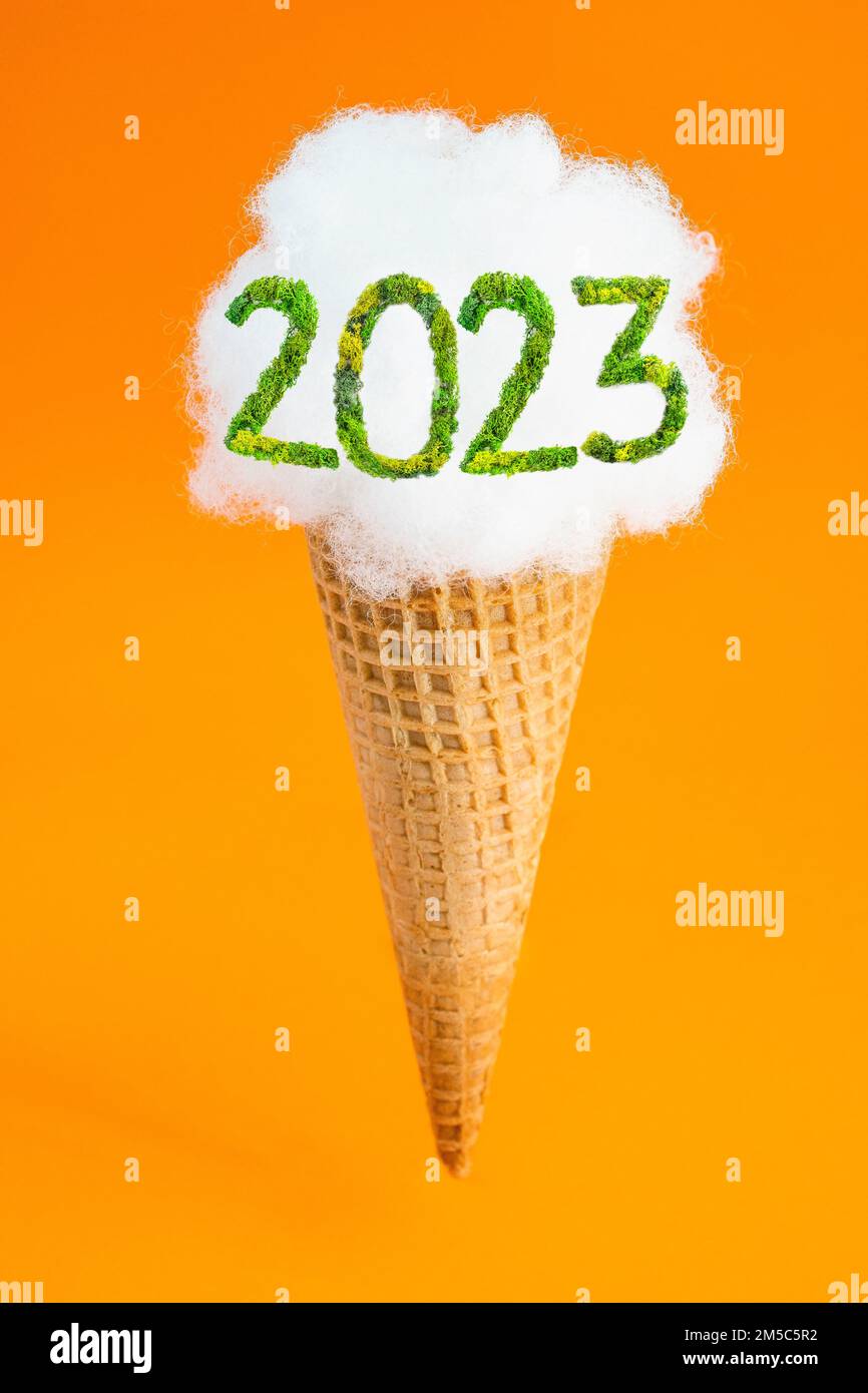 Ice cream cone with polyester filling floating , levitating on a orange ...