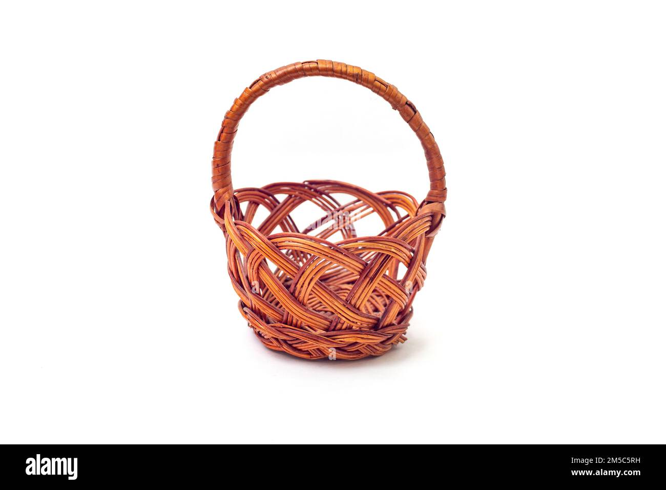 woven wooden basket, isolated on white background Stock Photo - Alamy