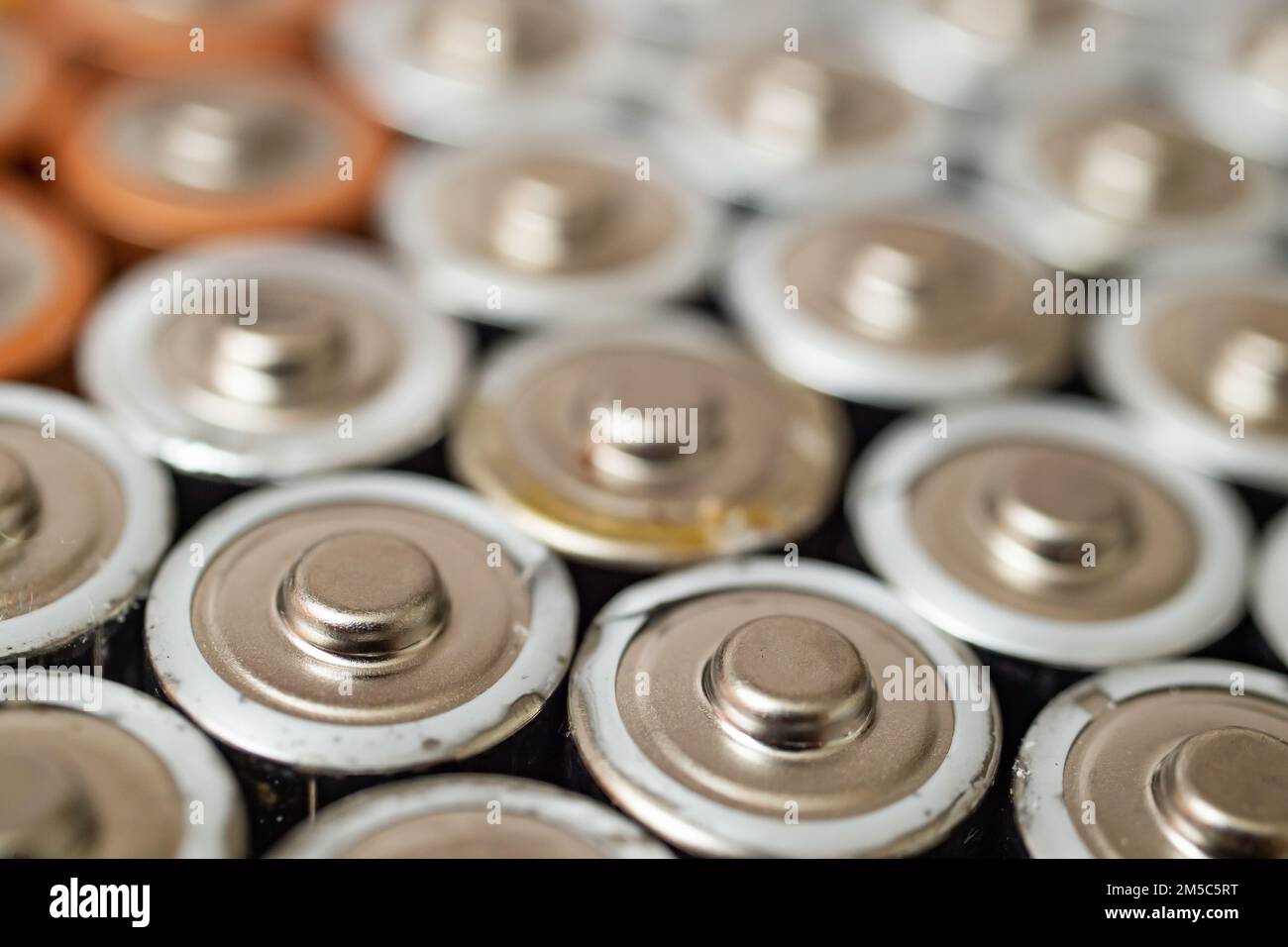 many batteries stacked, soft focus macro Stock Photo - Alamy