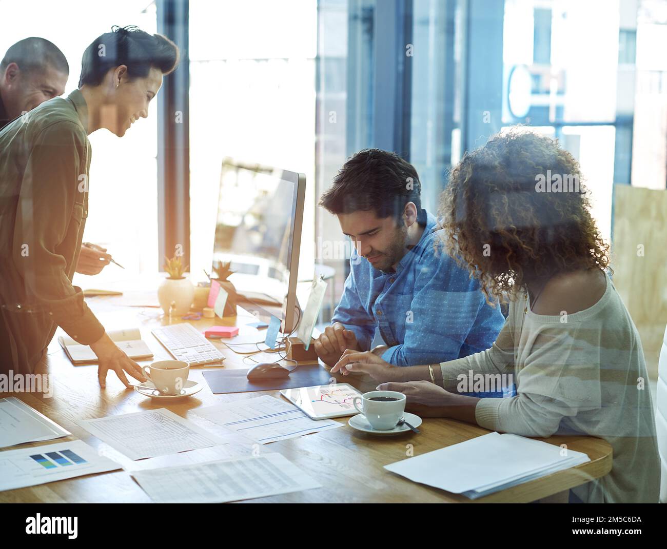 Making smart decision through mind mapping. businesspeople working in ...