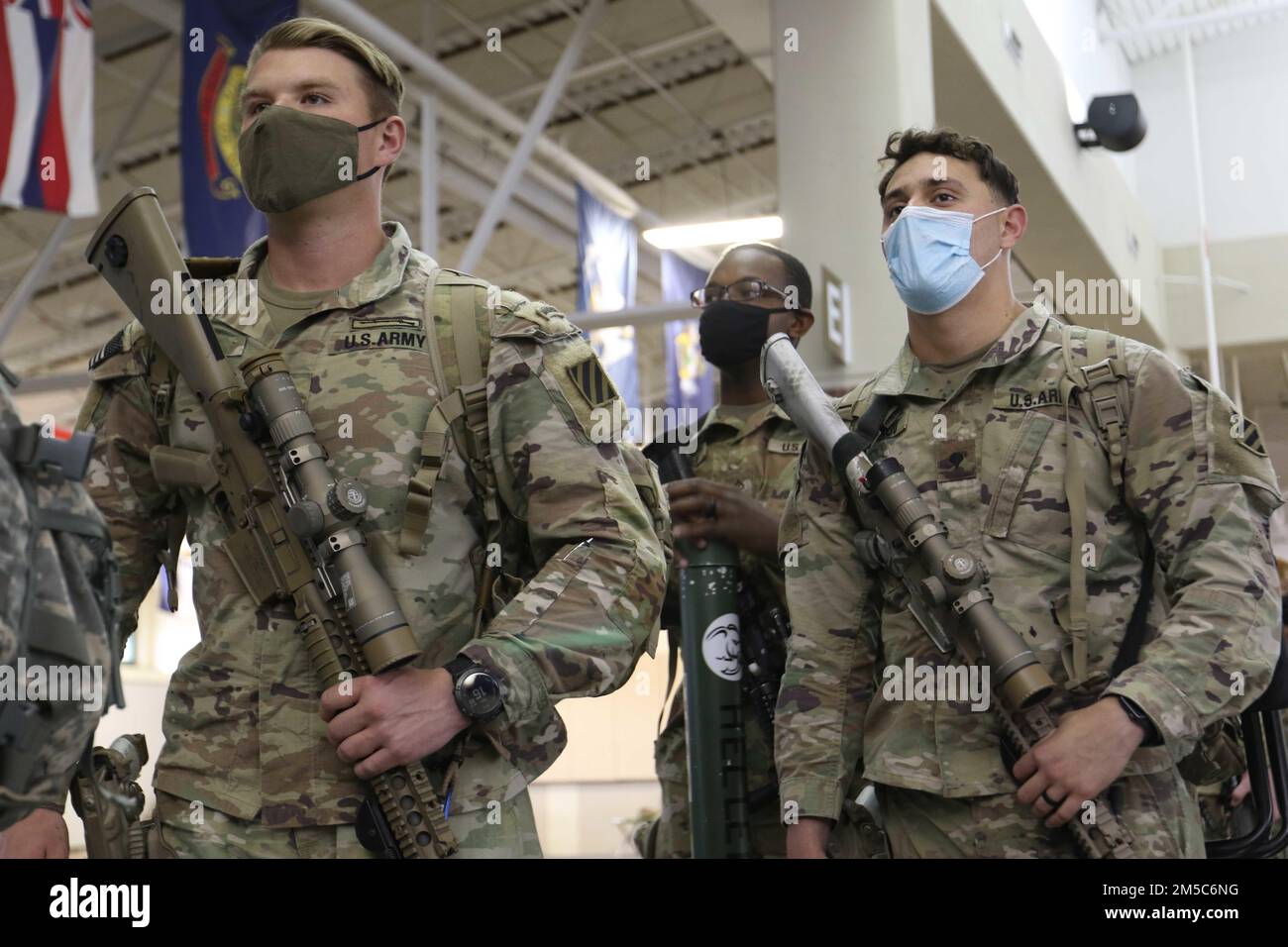 U.S. Army Sgt. Blayne Adams, left, Pfc. Jaylon Booker, middle, and Spc ...