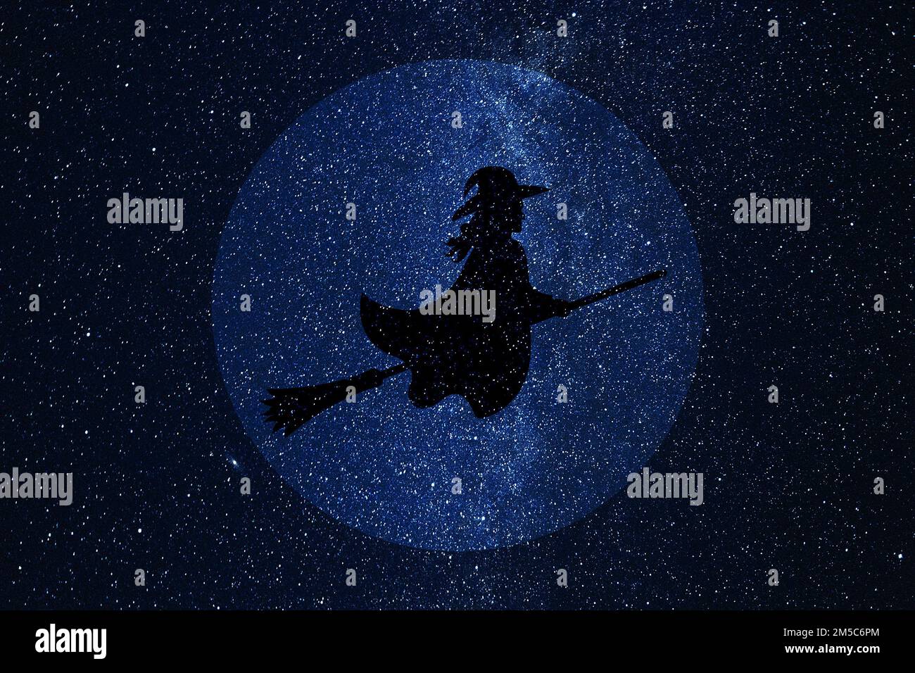 Silhouette of witch flying on broomstick against background of night ...