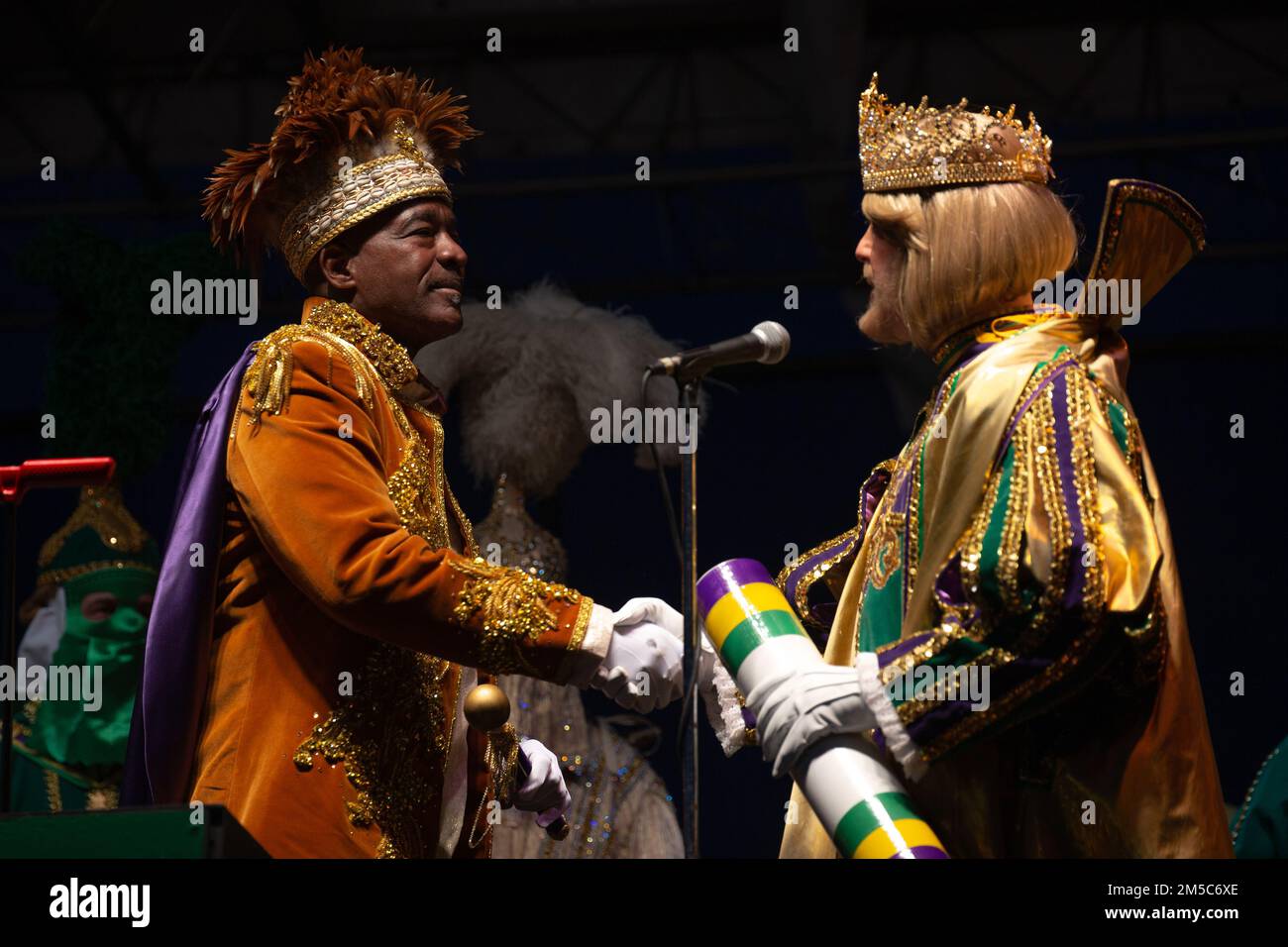 James Reiss III, crowned Rex, shakes hands with Randolph Davis, king of ...